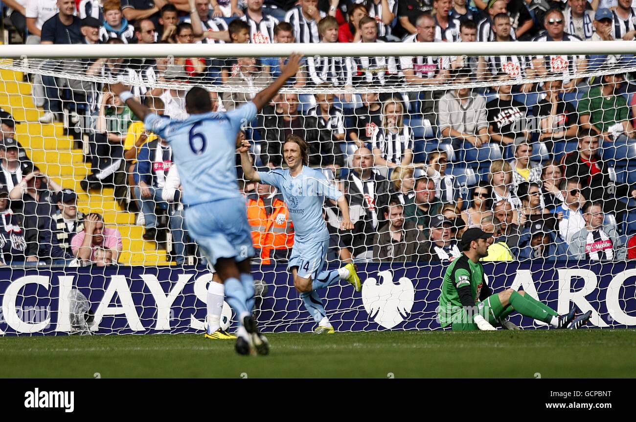 Tottenham Hotspur's Luka Modric (centre) celebrates scoring his sides ...