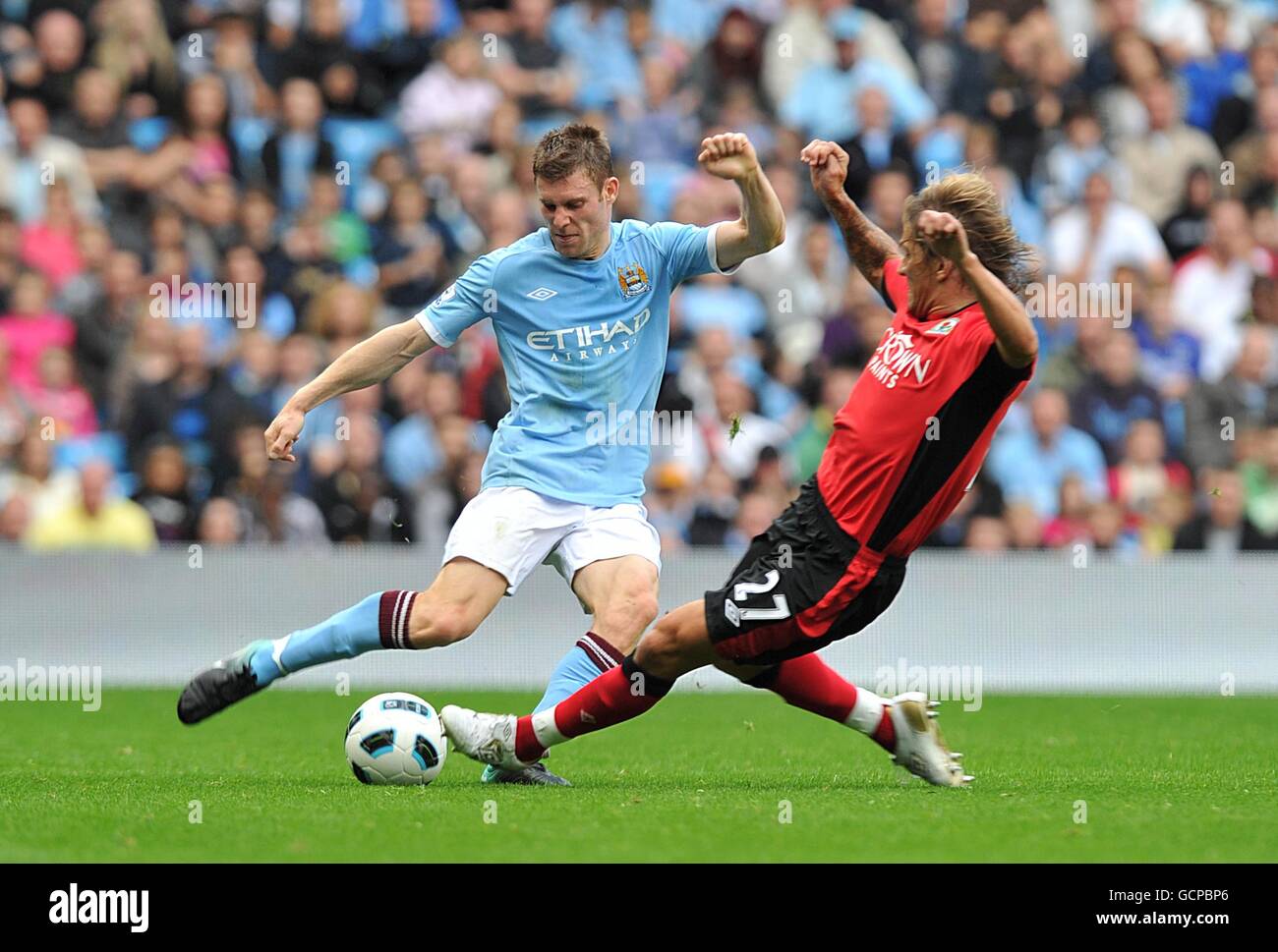 Manchester City's James Milner (left) and Blackburn Rovers' Michel ...