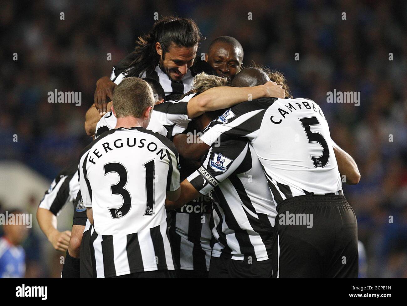 Newcastle United's Ryan Taylor (obscured) is mobbed by team-mates after ...