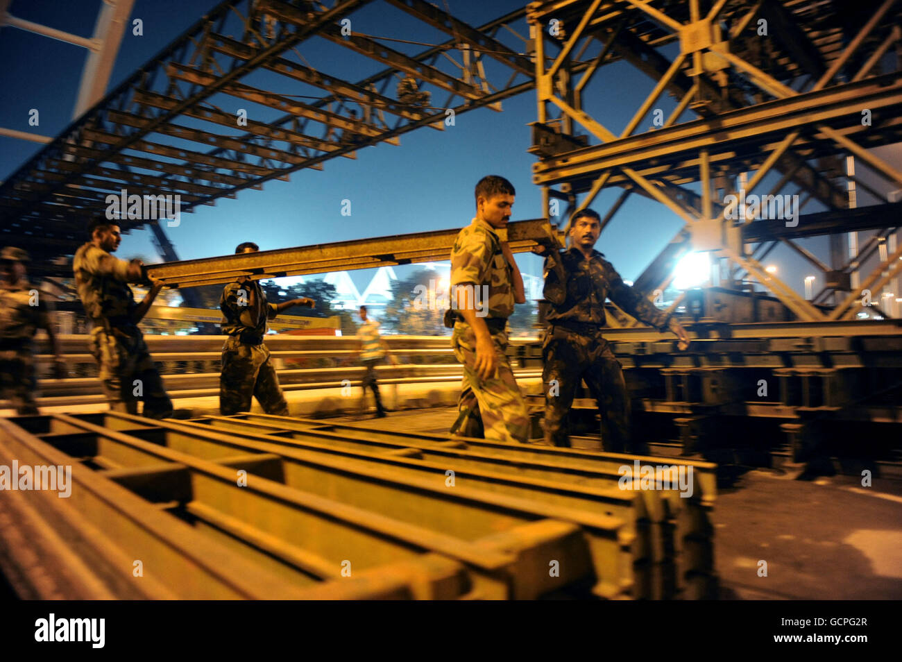 The Army continue construction work through the night on a replacement ...