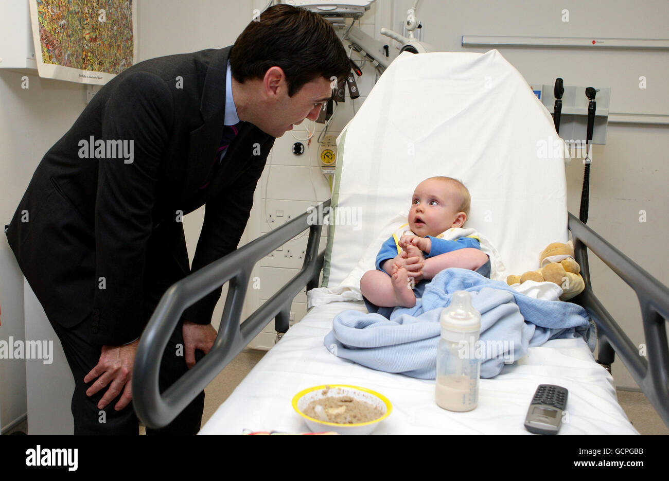 Shadow Health Secretary Andy Burnham talks to 9-month-old Ethan Crew ...