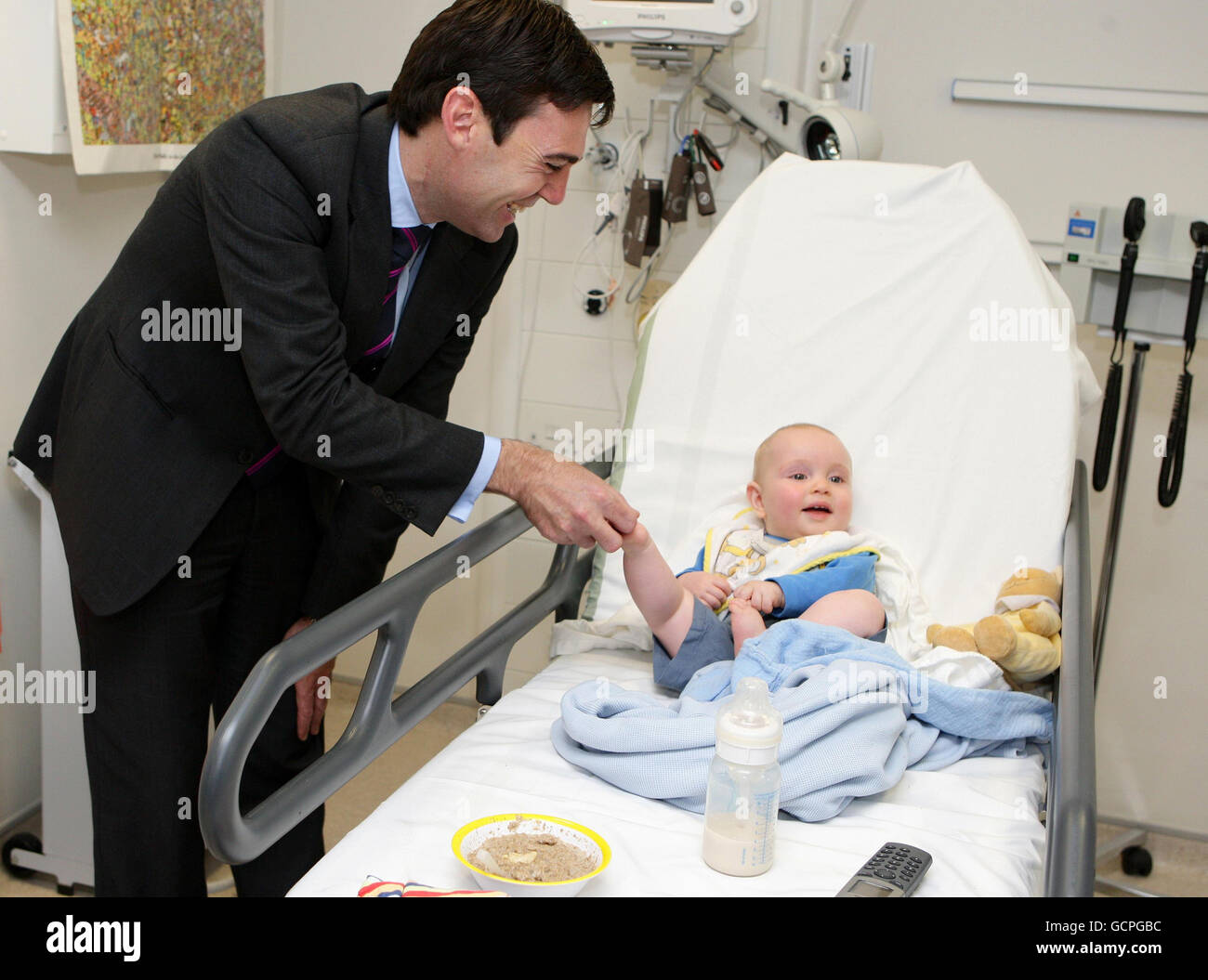 Shadow Health Secretary Andy Burnham talks to 9-month-old Ethan Crew ...