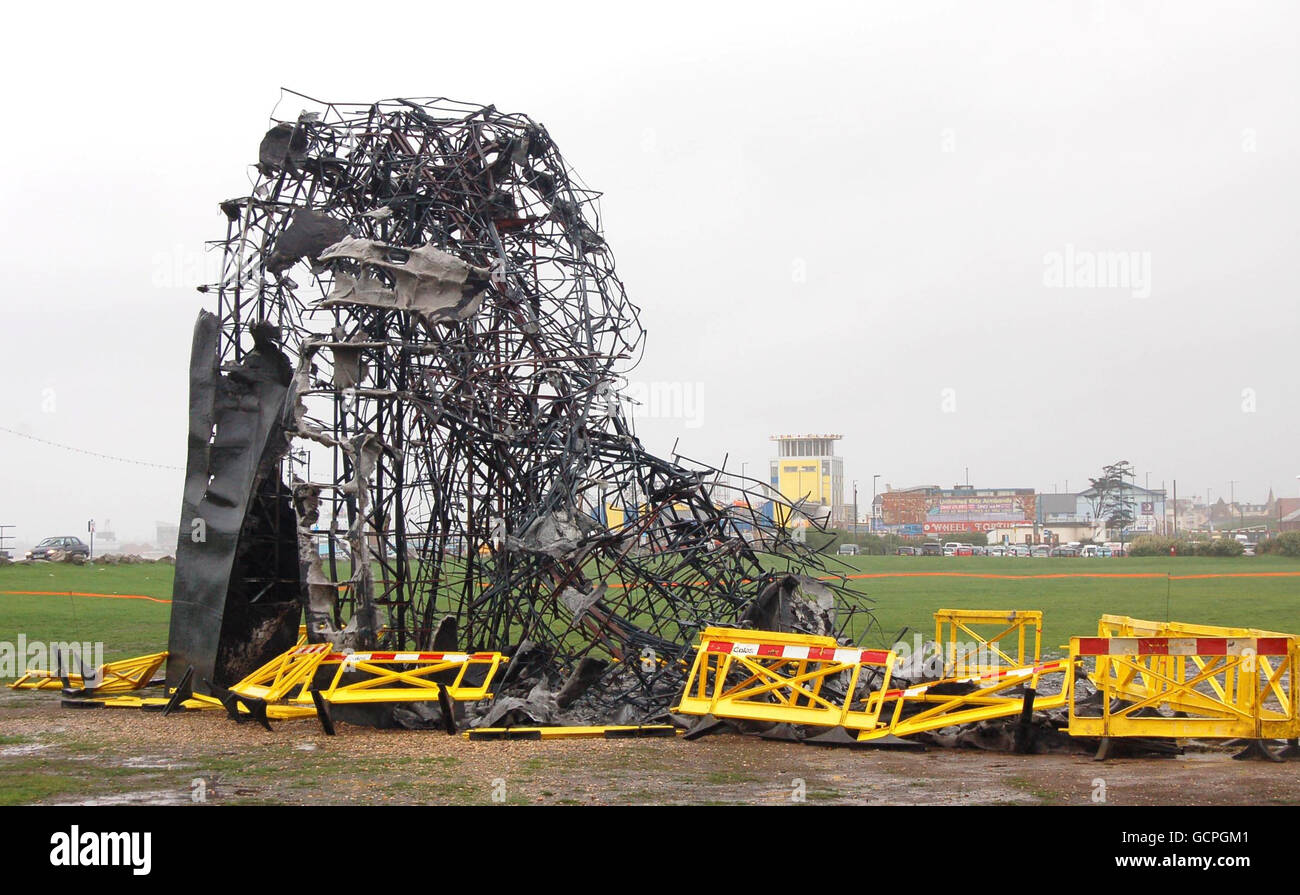 Dinosaur statue destroyed by fire Stock Photo - Alamy