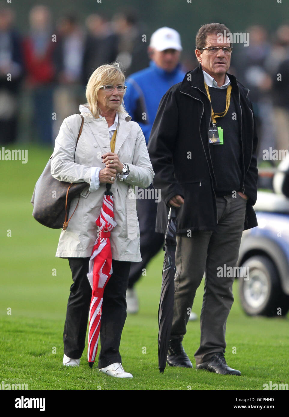 England manager Fabio Capello and his wife Laura watch the golf Stock ...