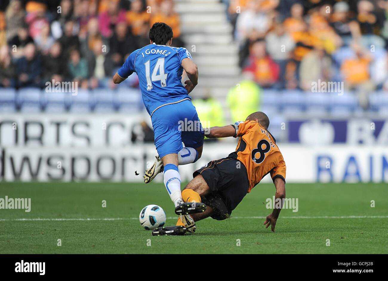 Wigan Athletic's Jordi Gomez (left) is fouled by Wolverhampton ...