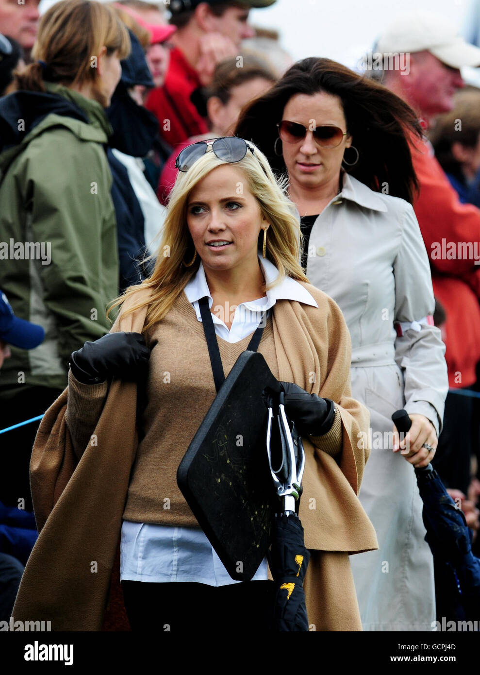 Amy Mickelson arrives at the fifth green to watch her husband during ...