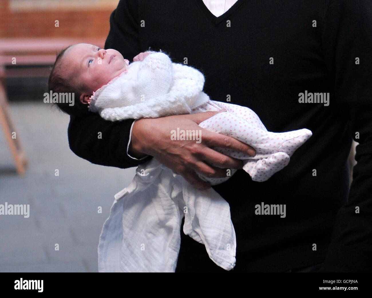 Florence Cameron in the arms of her father Prime Minister David Cameron ...