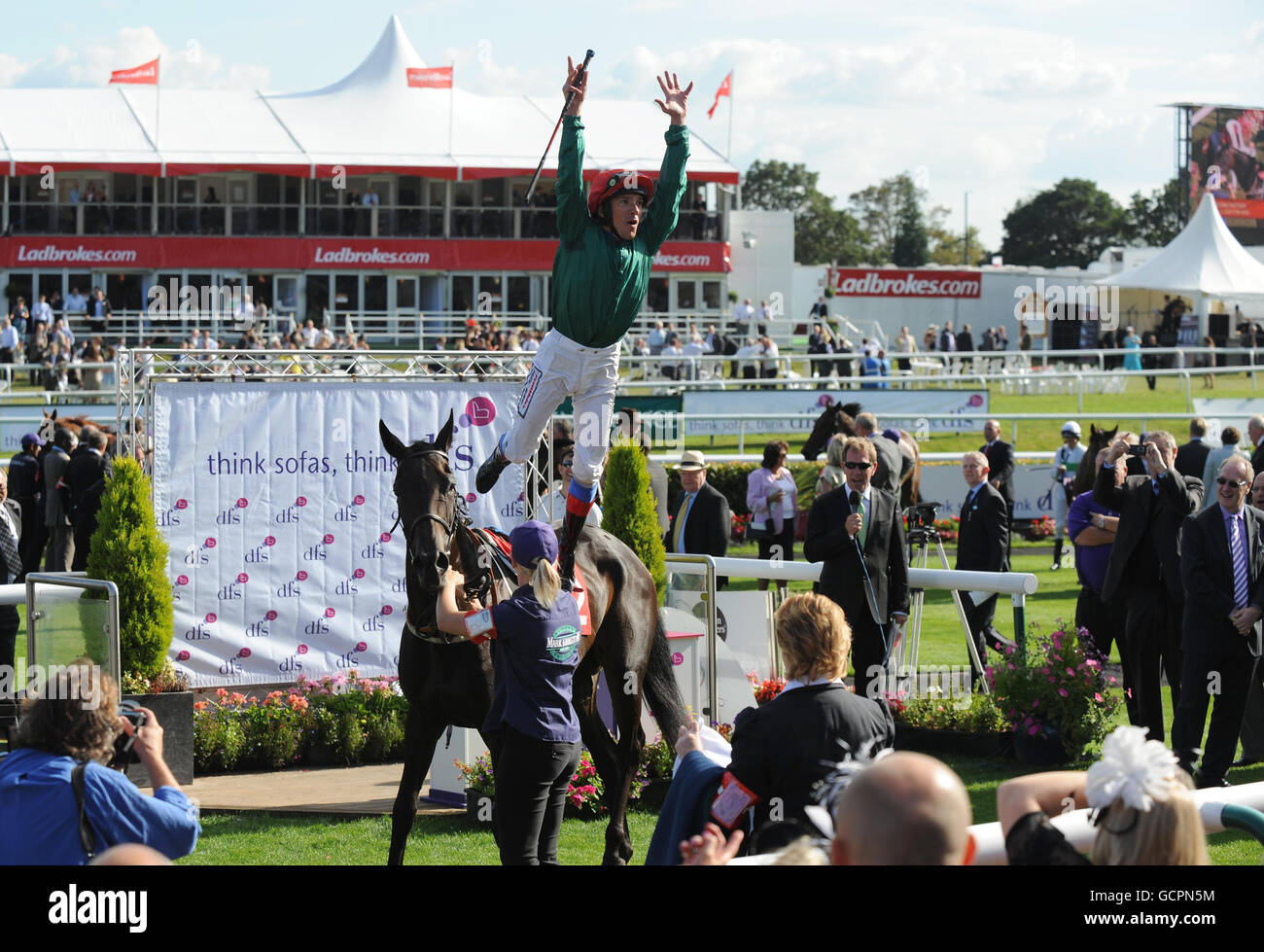 Racing doncaster full length jumping jockey crowd mangkk hi-res stock ...