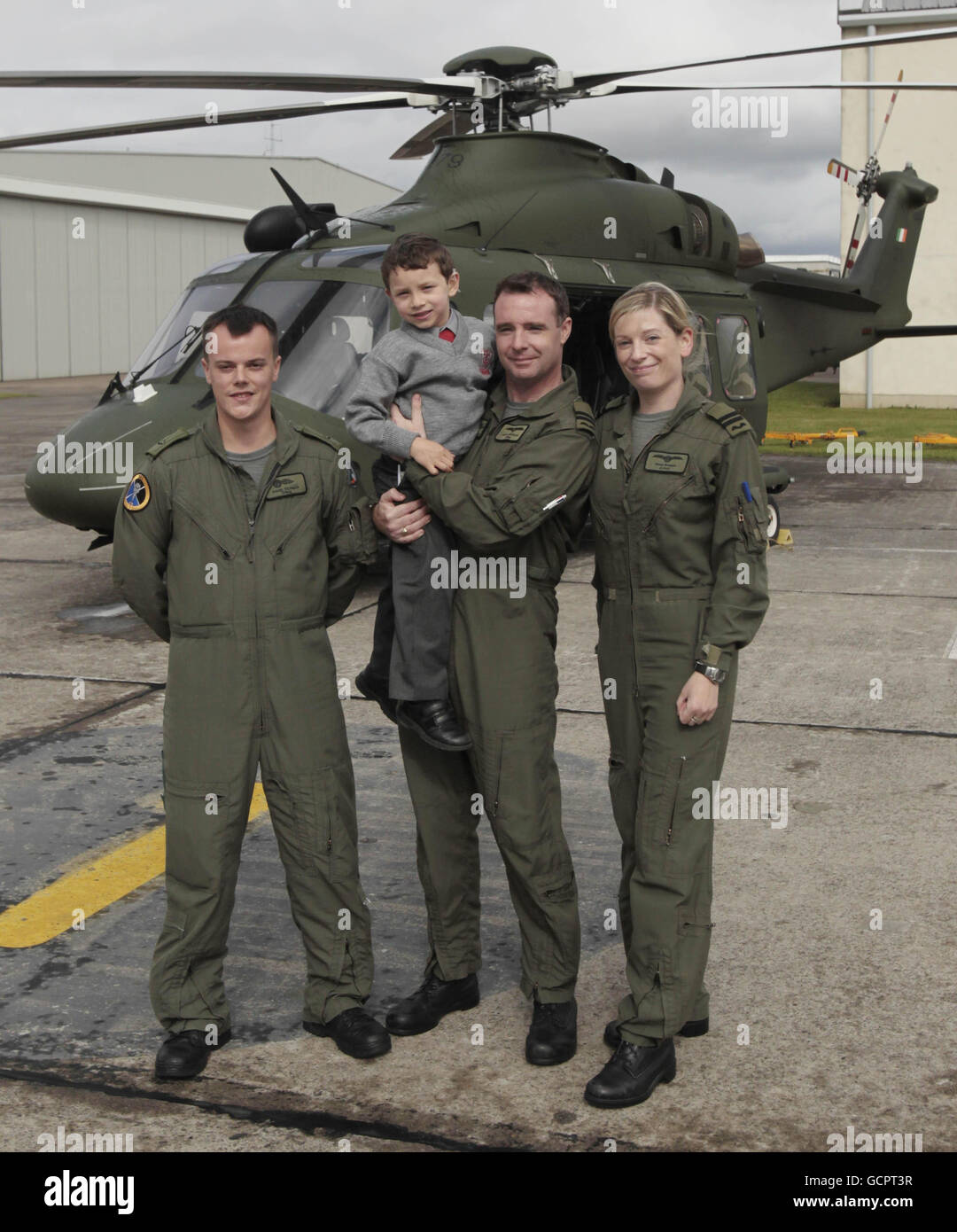 Six-year-old Conor Reidy meets (left to right) aircrew members David ...