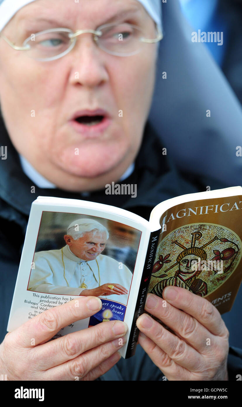 A nun prays during an open air mass lead by Pope Benedict XVI at Cofton ... A nun prays during an open air mass lead by Pope Benedict XVI at Cofton ...