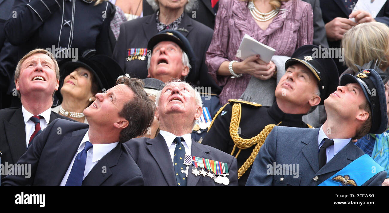 Prime Minister David Cameron and Prince William watch a flyby during ...