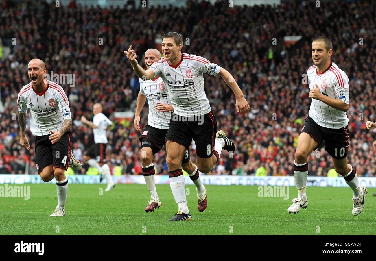 Liverpool's Steven Gerrard (centre) celebrates after scoring his side's ...