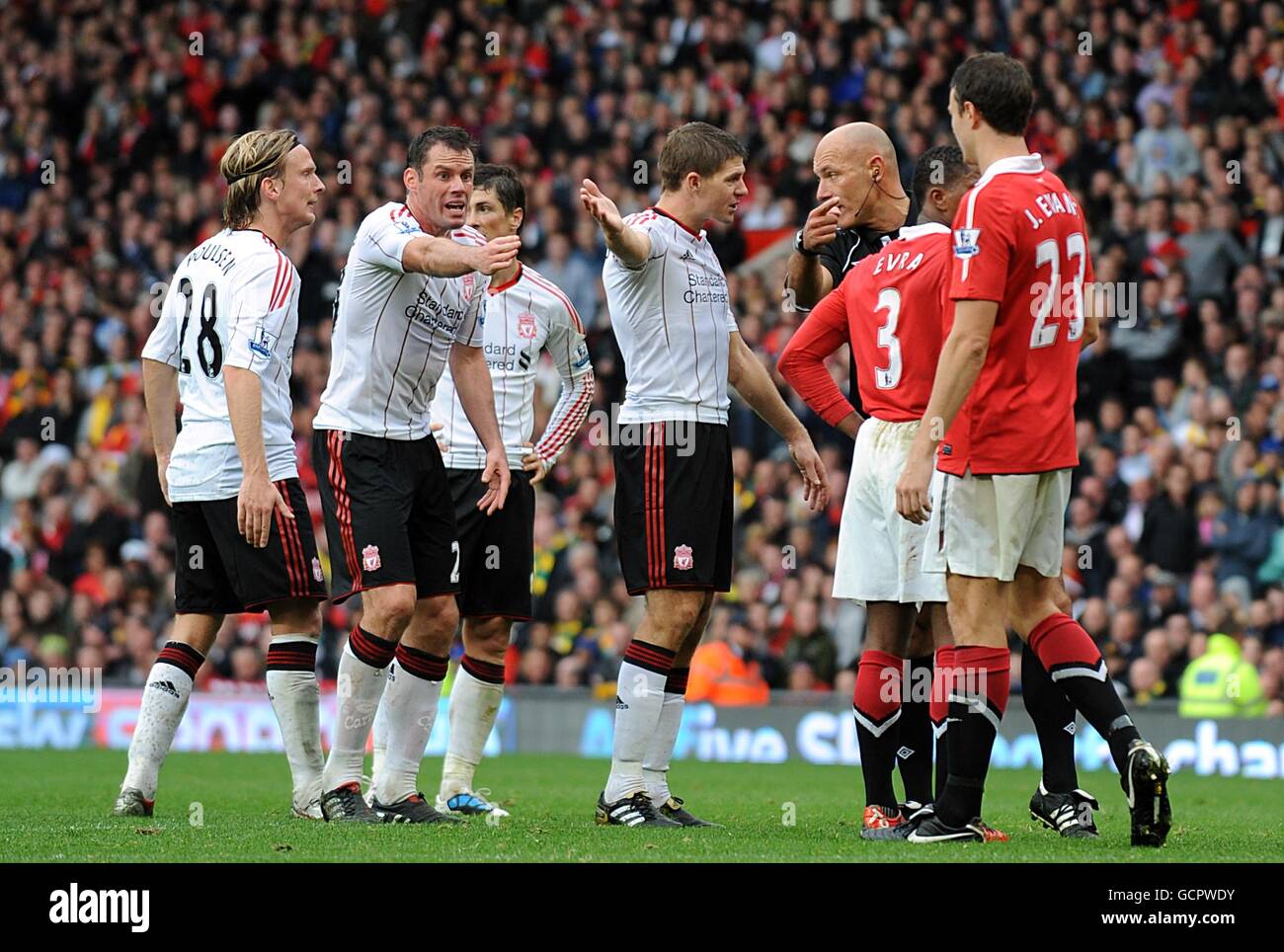 Livepool's Steven Gerrard (centre) appeals to referee Howard Webb after ...
