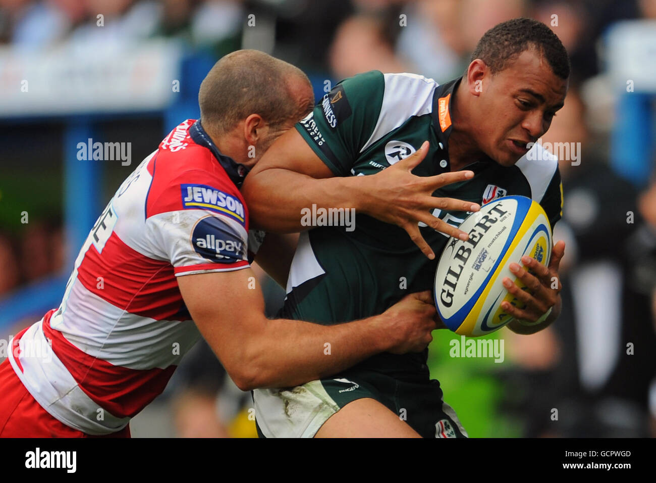London Irish's Jonathan Joseph and Gloucester Rugby's Charlie Sharples ...