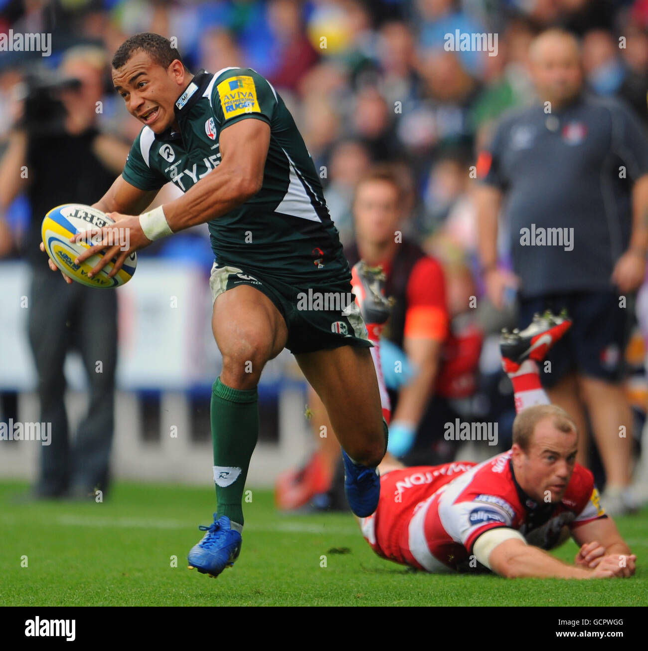London Irish's Jonathan Joseph leaves Gloucester Rugby's James Simpson ...