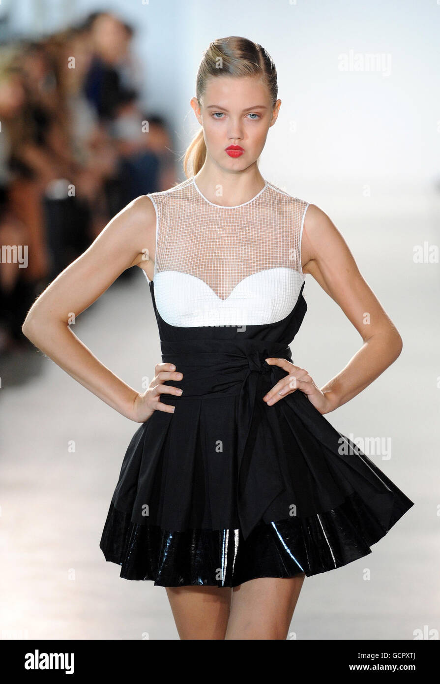 Consumer fashion half length mid model modelling runway mangdm hi-res stock photography and ...