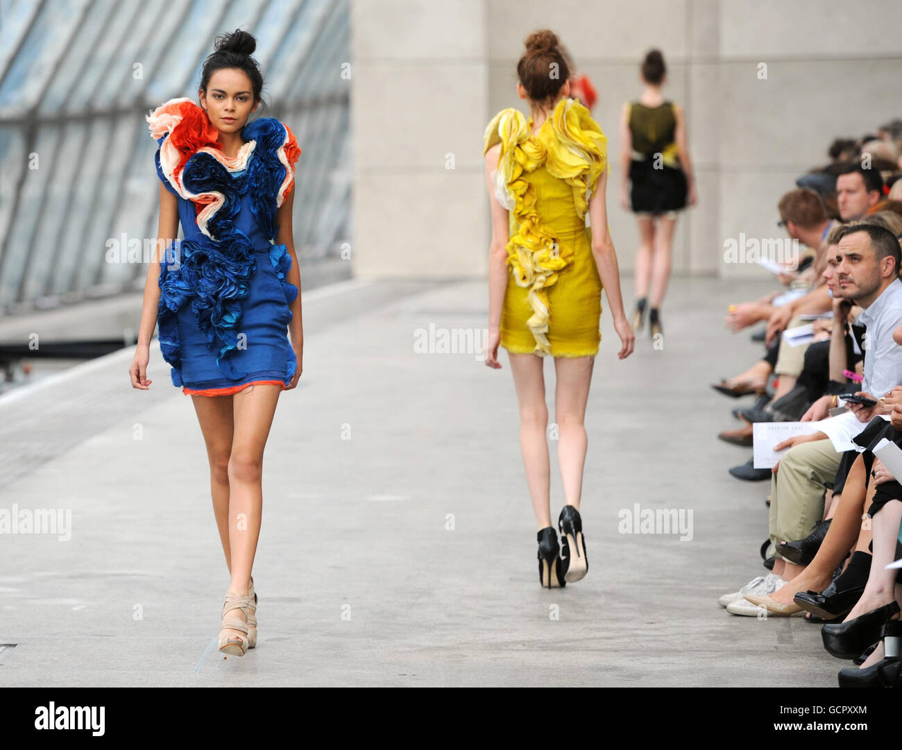 Models on the catwalk during the Fashion East by Topshop shown in the ...
