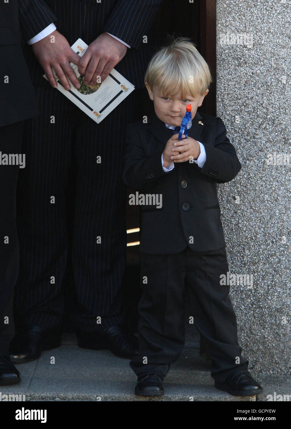Jamie Pool ,two, the son of Lance Corporal Joseph Pool plays with a toy ...