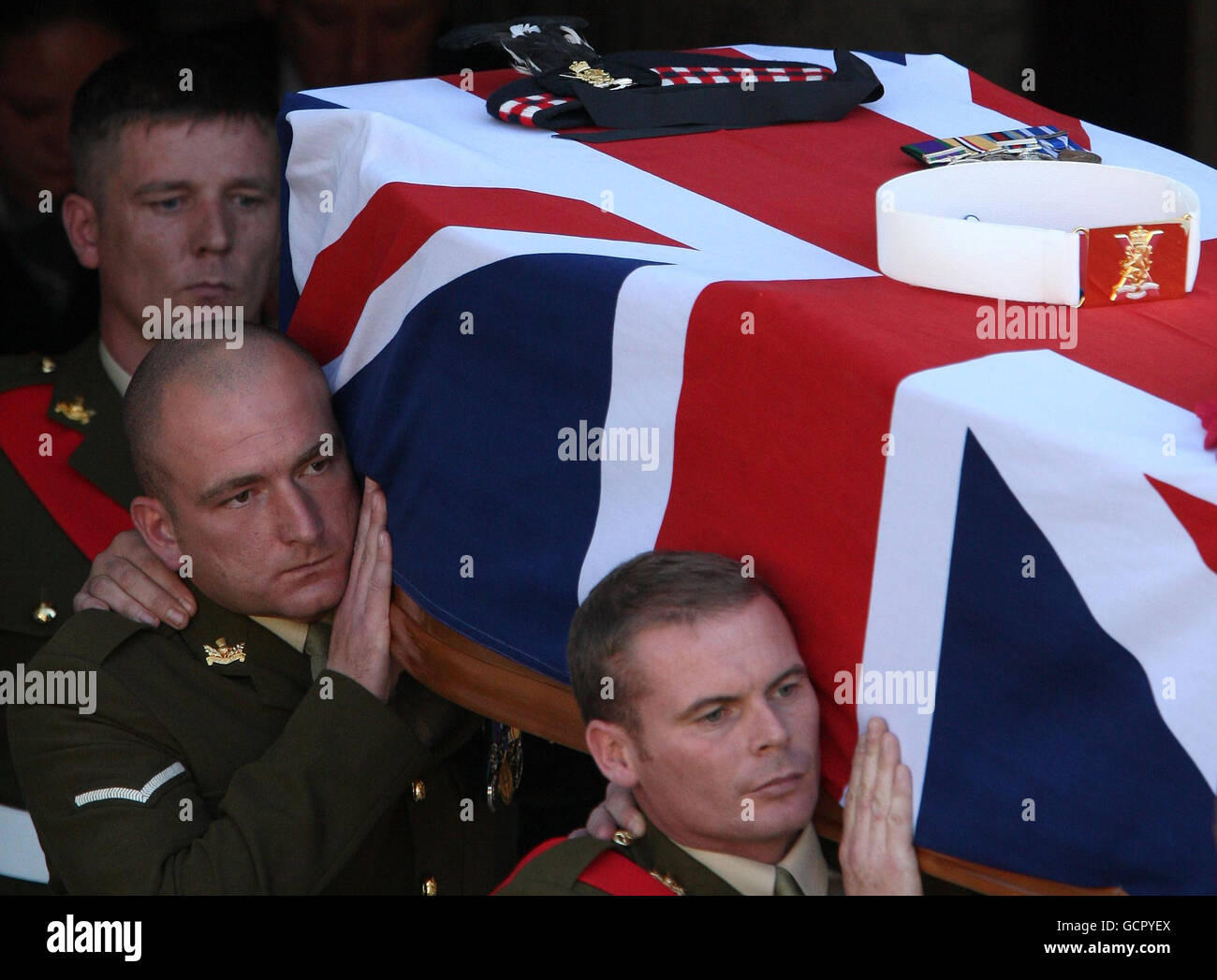 The coffin of Lance Corporal Joseph Pool is carried from St Andrews ...