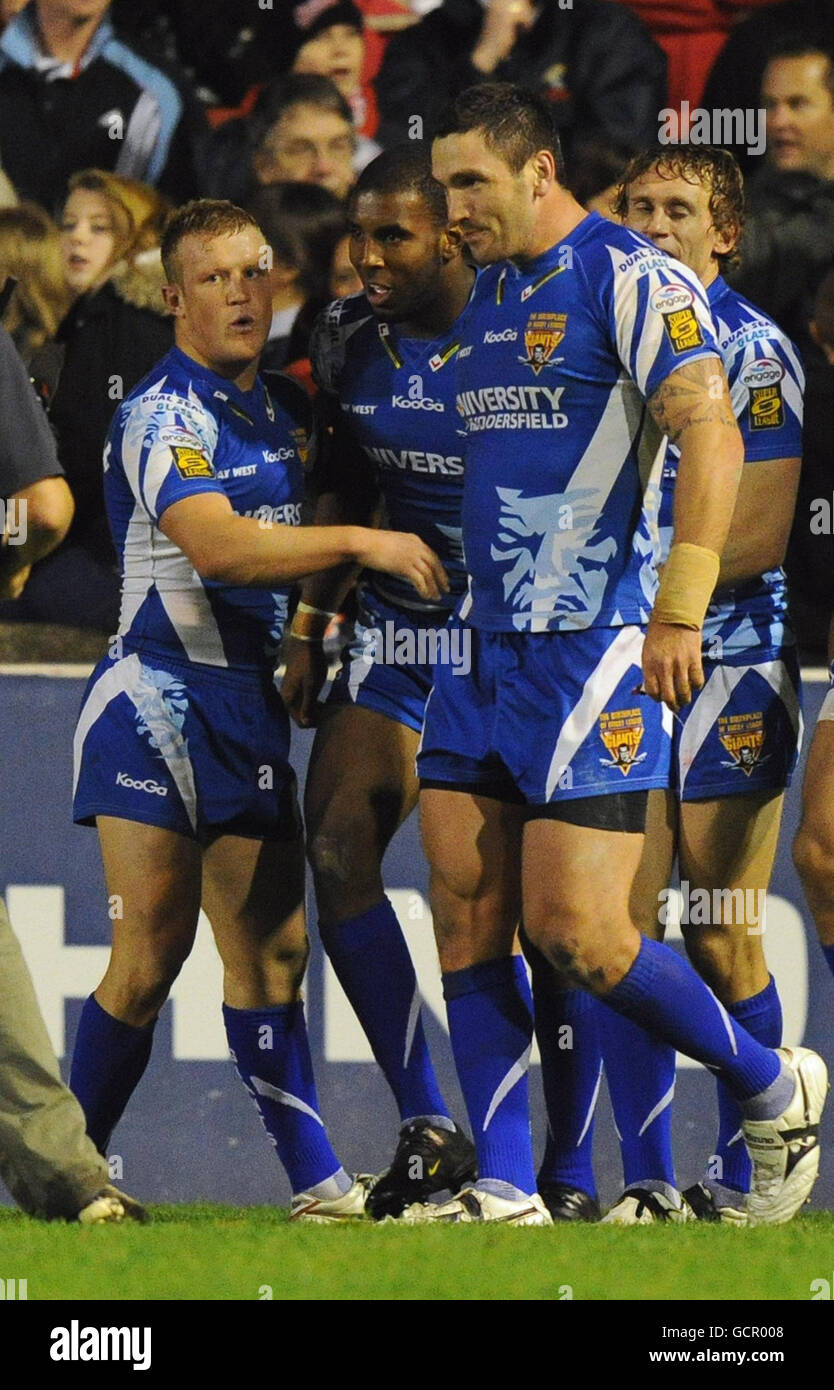 Huddersfield Giants' Michael Lawrence is congratulated on scoring his ...