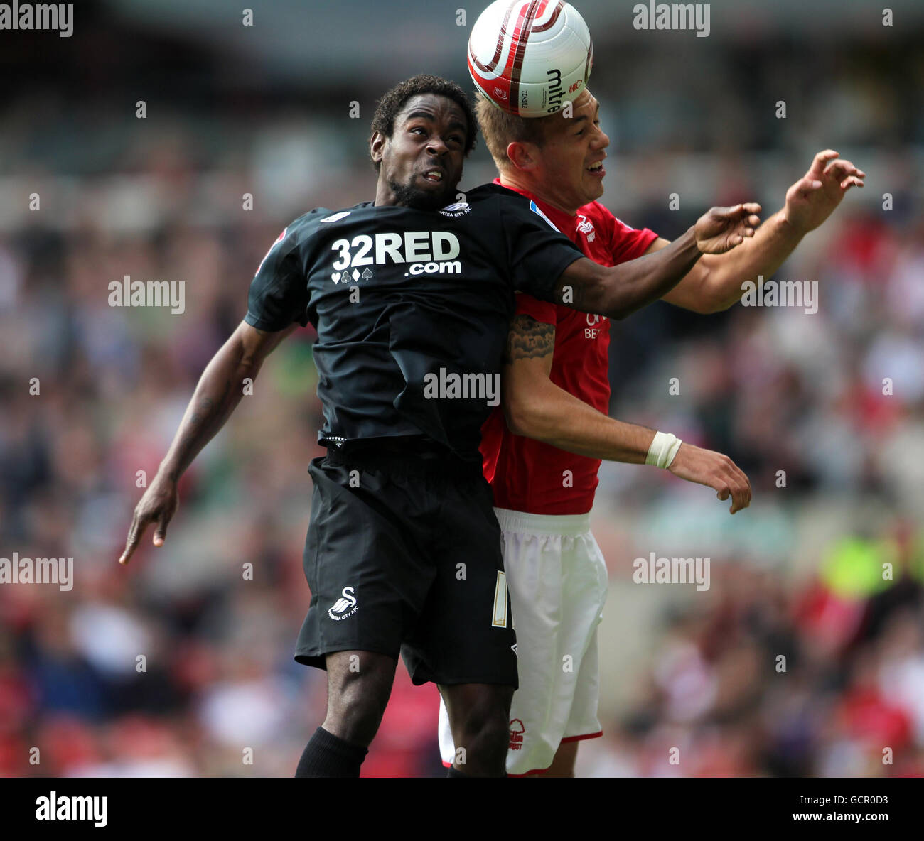 Nottingham Forest's Luke Chambers (right) and Swansea City's Nathan ...
