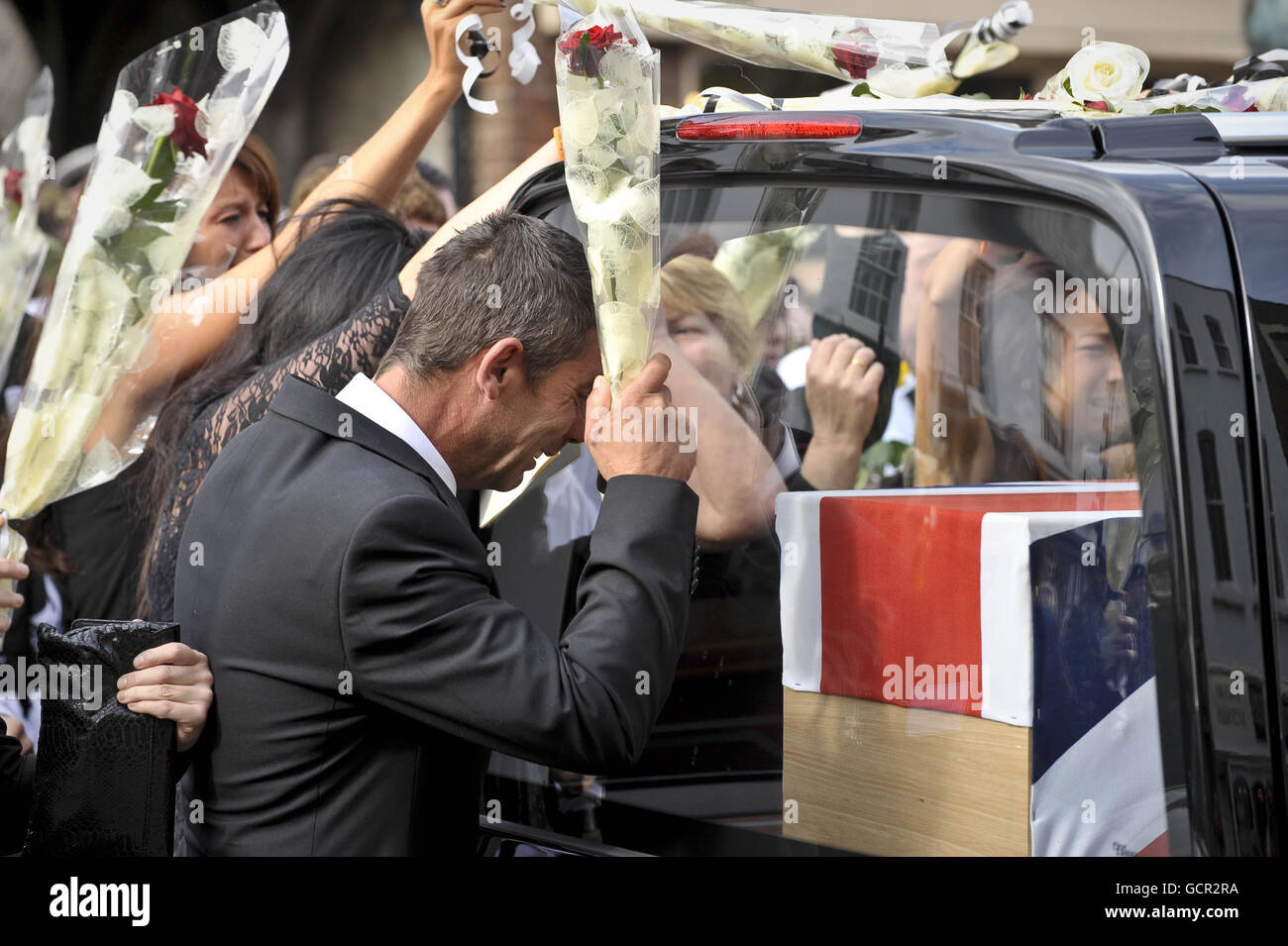 Friends and family (names not known) of Corporal Matthew Thomas, from ...