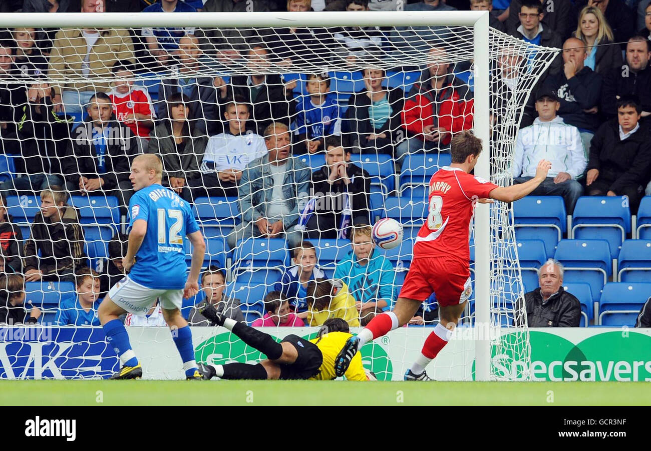 Crewe's Luke Murphy (right) scores the first goal of the game during ...
