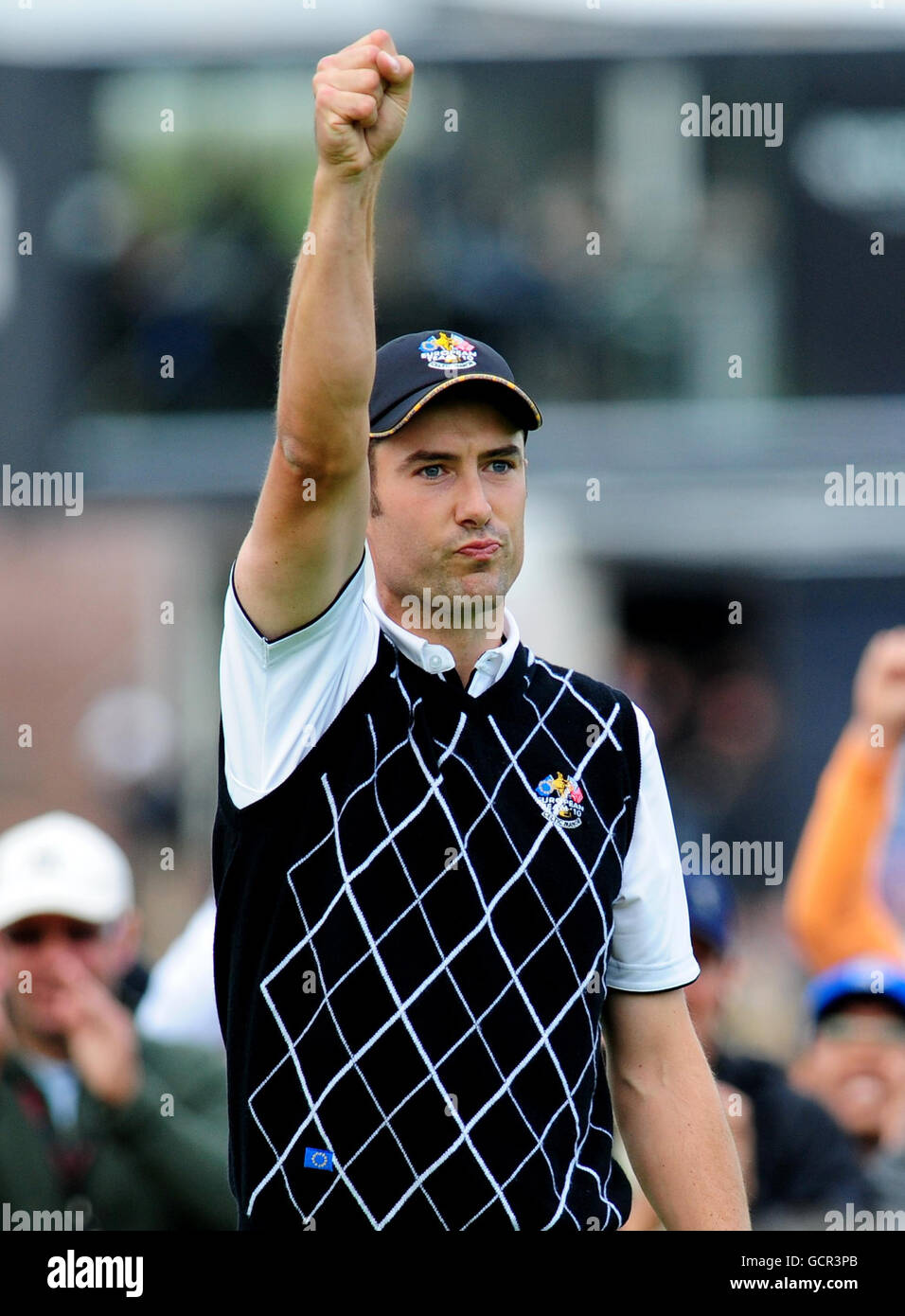 Europe's Ross Fisher celebrates after winning putt during the Saturday ...