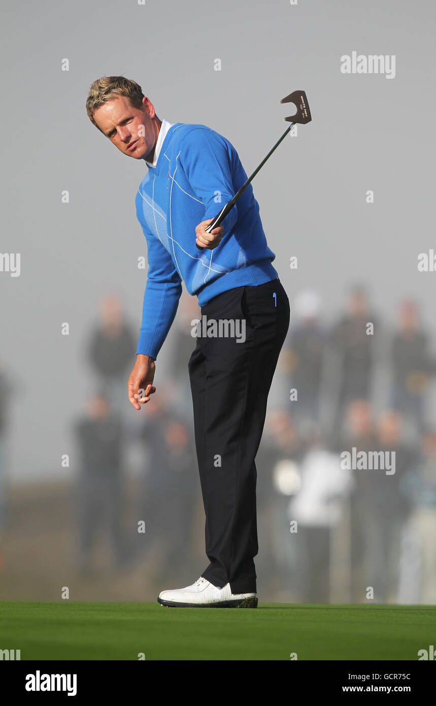Europe's Luke Donald holds his putter in the air after missing a shot ...
