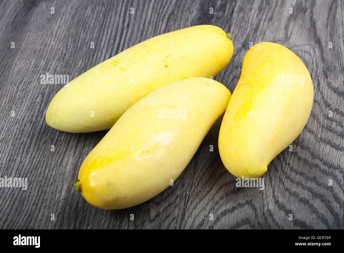 Fresh ripe sweet Yellow mango on wood background Stock Photo - Alamy