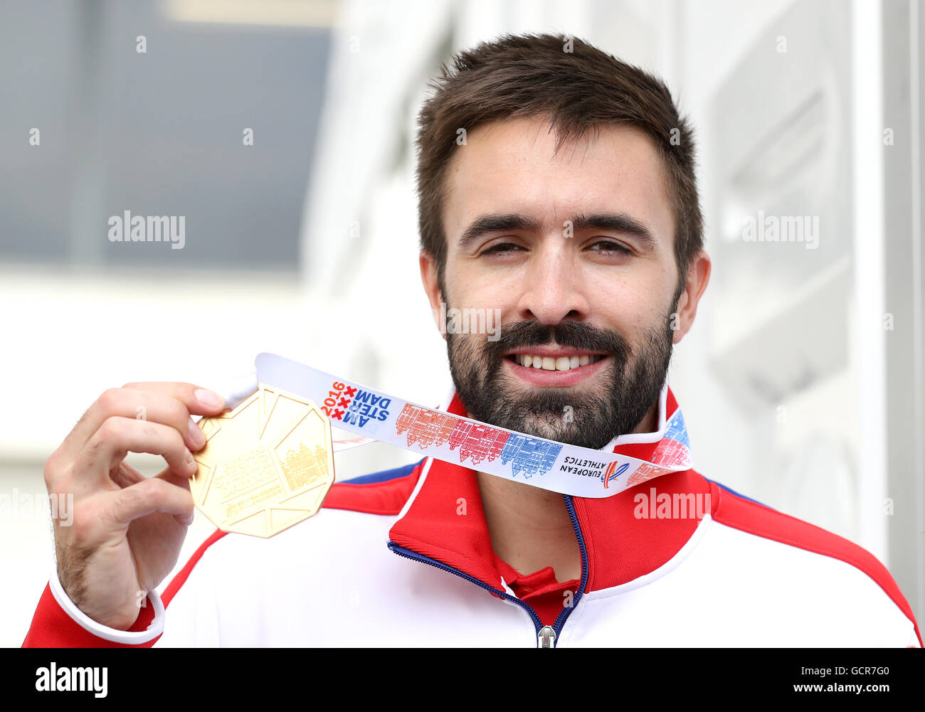 Great Britain's Martin Rooney with his gold medal after finishing first ...