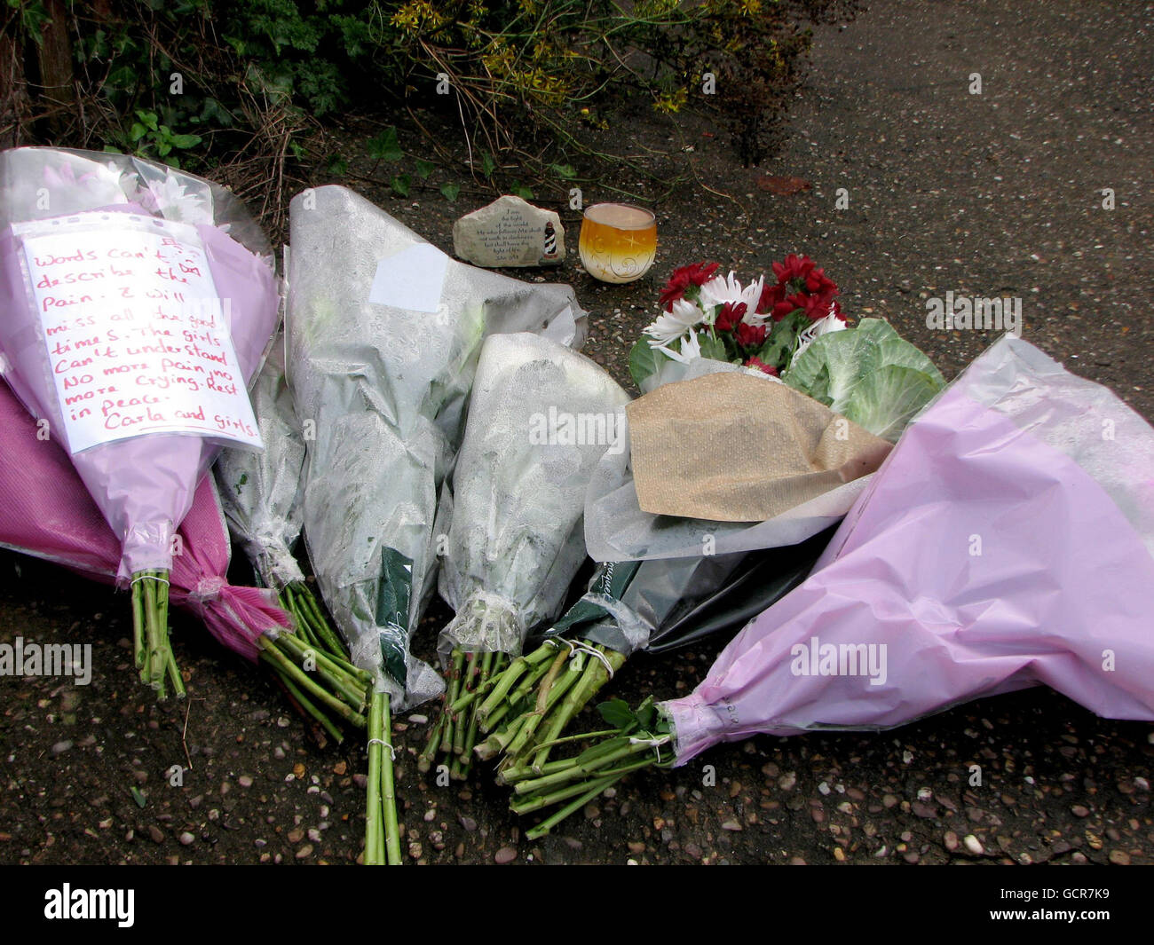 Flowers left scene outside house in springfield street hi-res stock ...