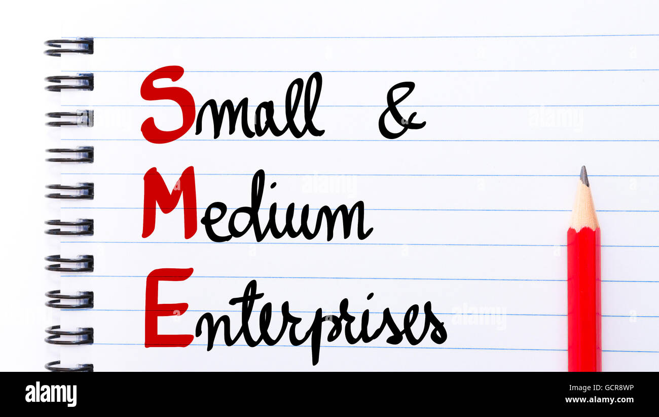 SME Small and Medium Enterprises written on notebook page with red ...