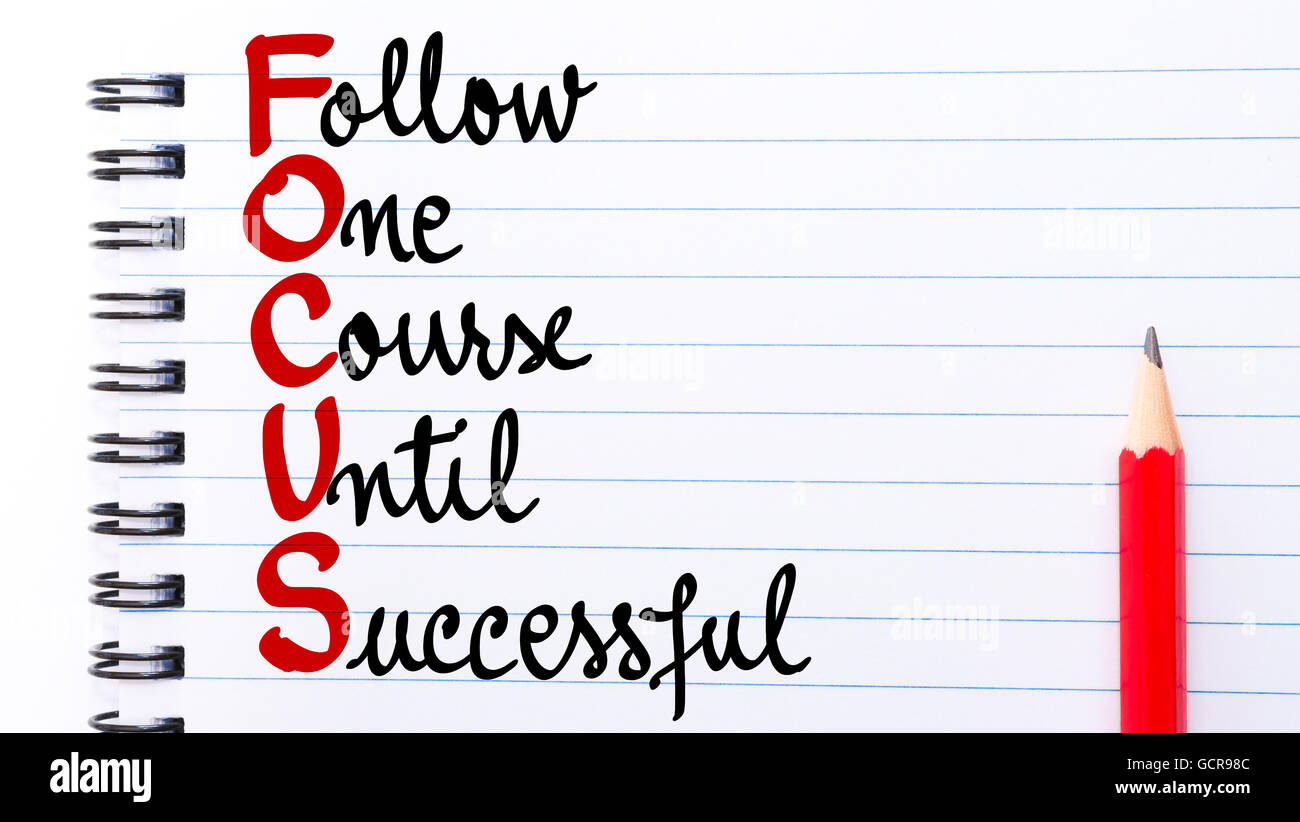 FOCUS Follow One Course Until Successful written on notebook page with ...