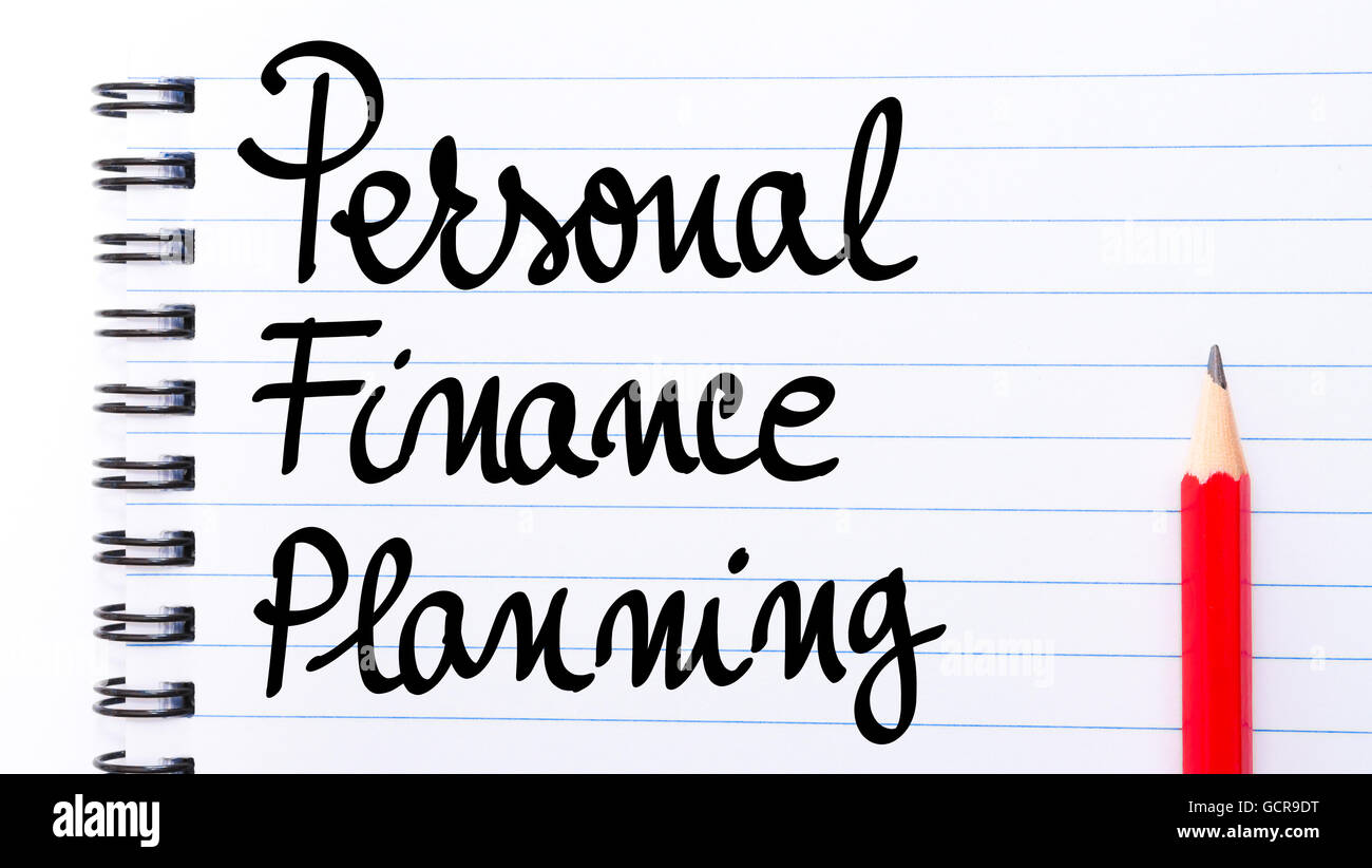 Personal Finance Planning written on notebook page with red pencil on ...