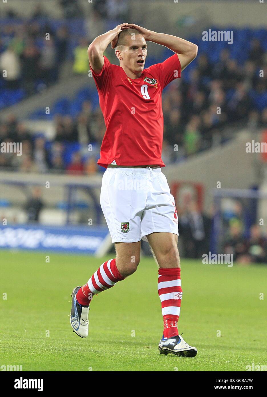 Football shot full length hands on head hi-res stock photography and ...