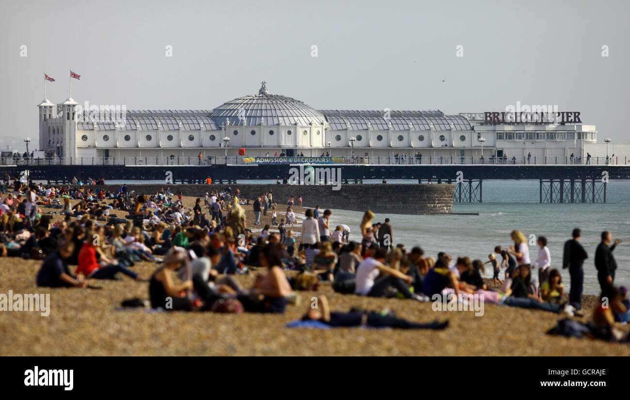 Sunbathers enjoy warm October temperatures on the beach in Brighton ...
