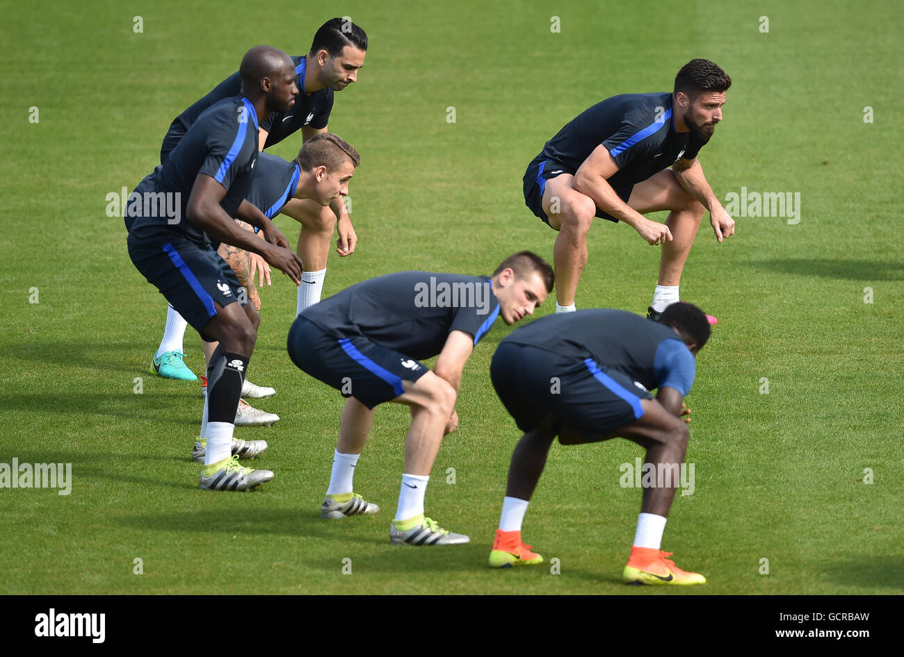 France's Olivier Giroud (top right) during a training session at the ...