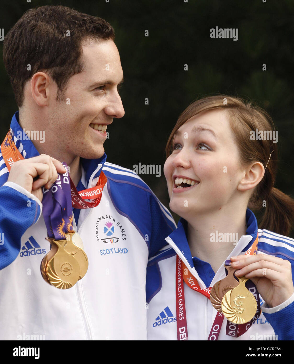 Gold medalists jon hammond and jennifer mcintosh at glasgow airport hi ...