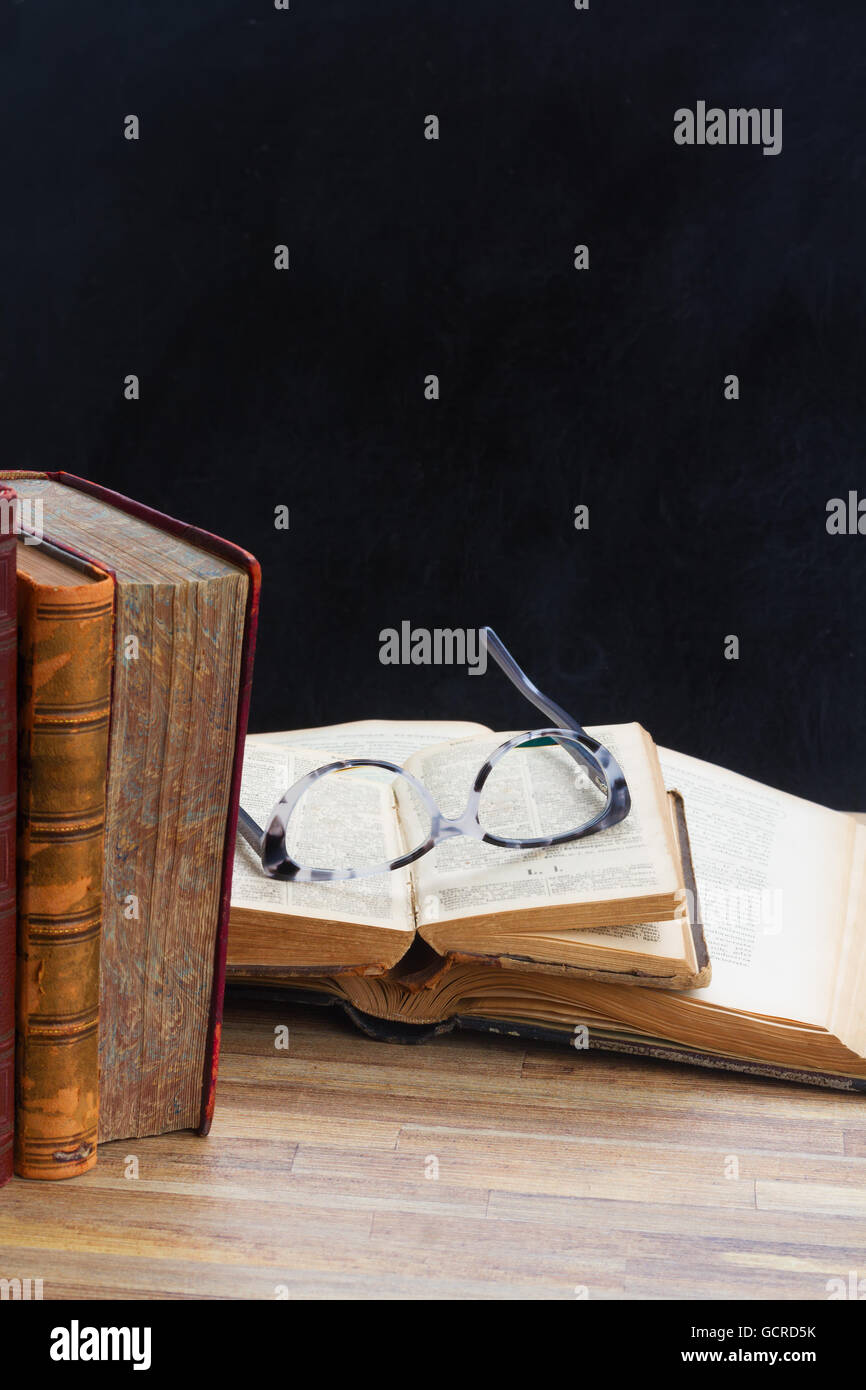 Books and glasses Stock Photo - Alamy