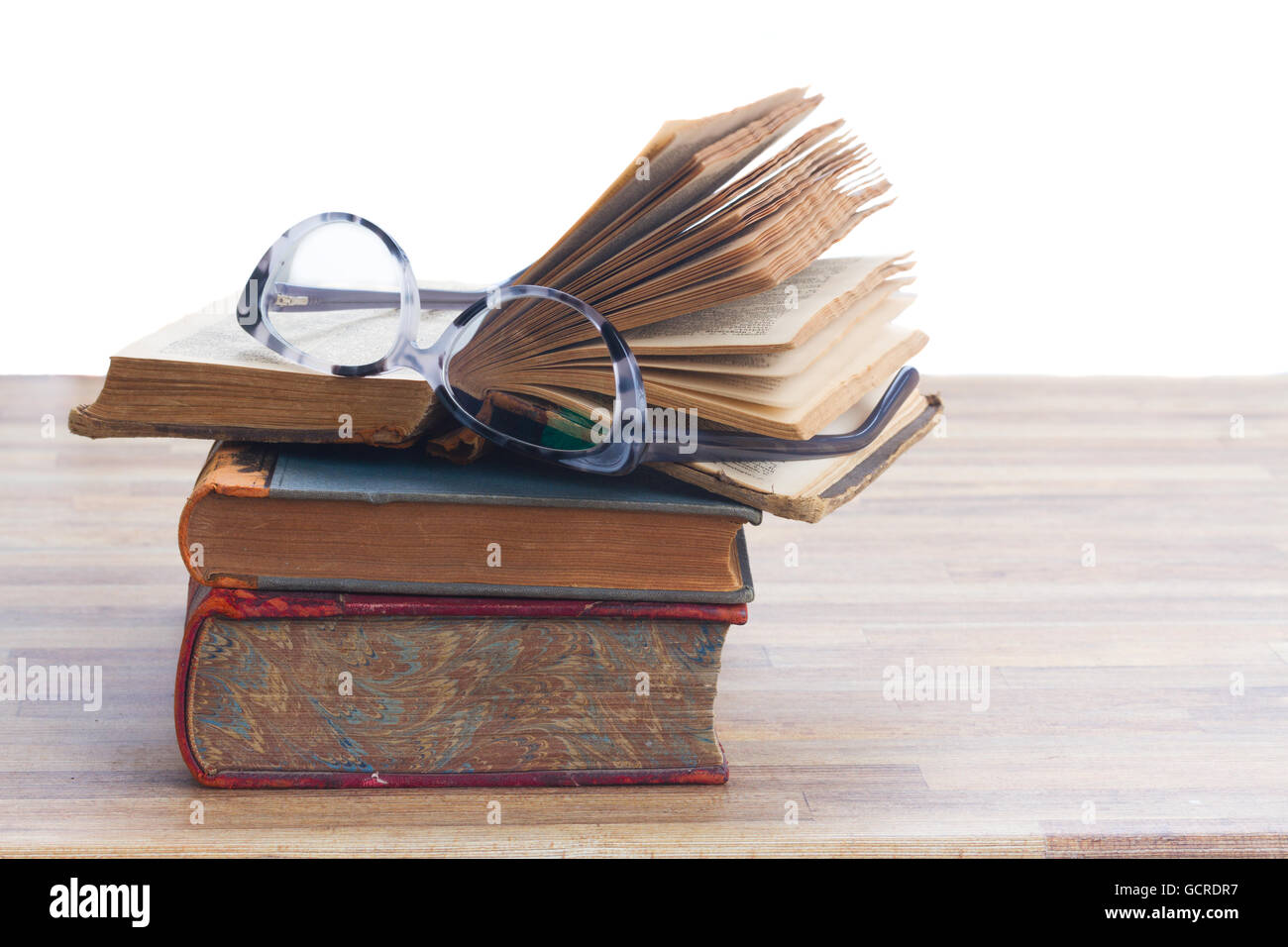 Books and glasses Stock Photo - Alamy