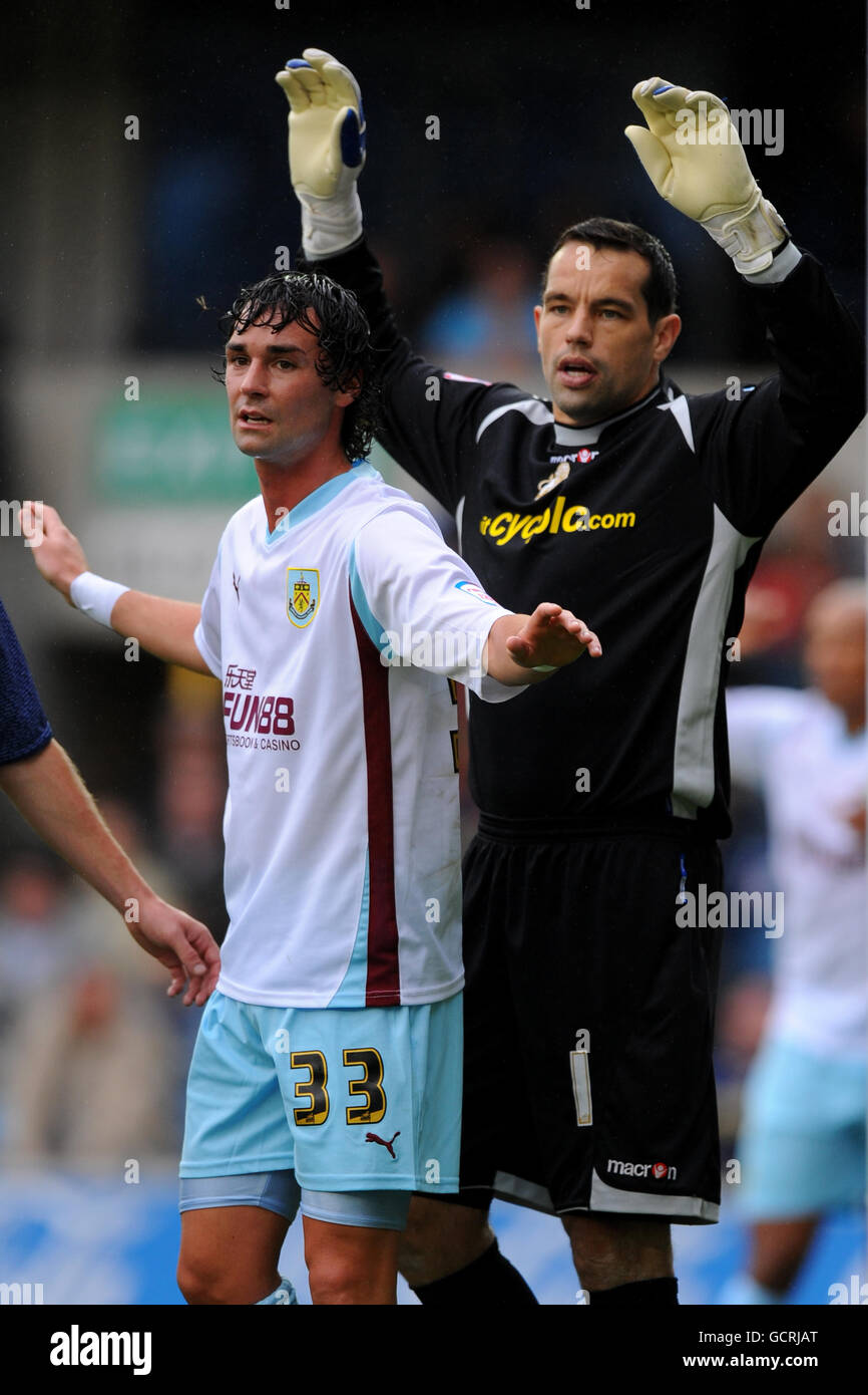 Millwall goalkeeper David Forde (right) and Burnley's Chris Eagles ...