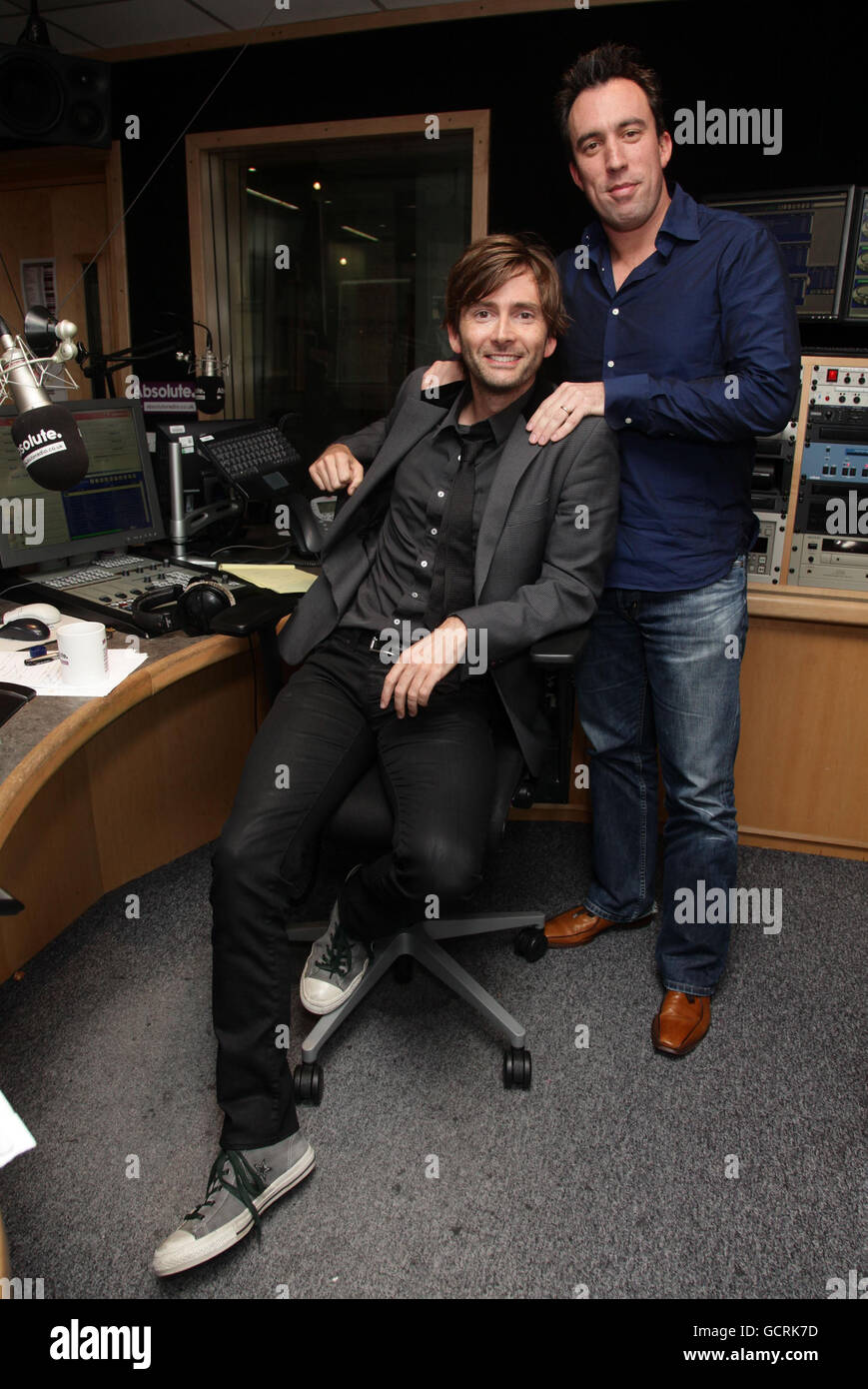 Showbiz tennant full length eye contact smiling mangsb hi-res stock ...