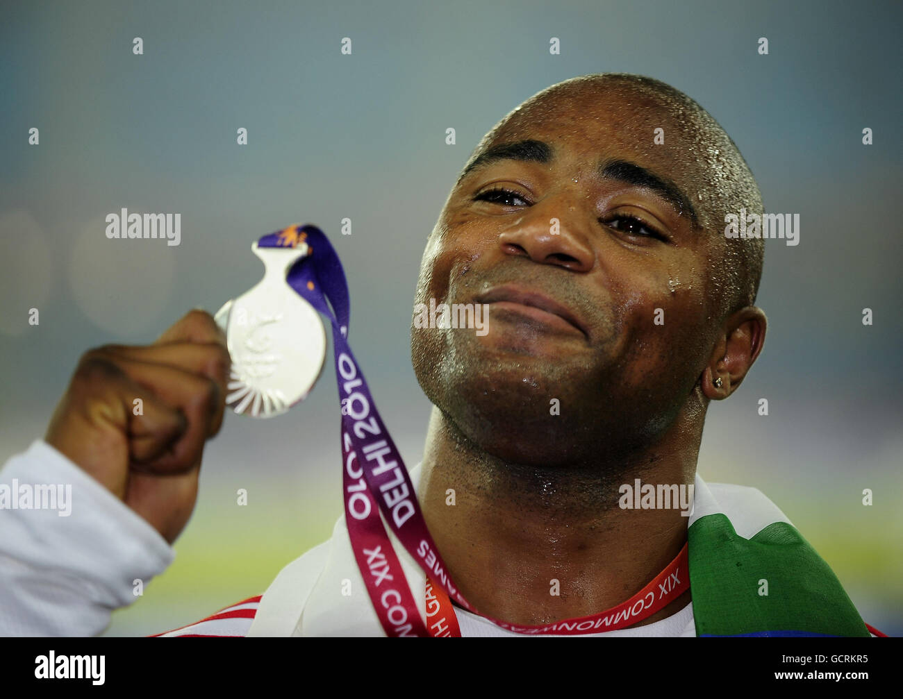 England's Mark Lewis Francis celebrates with his silver medal after the ...