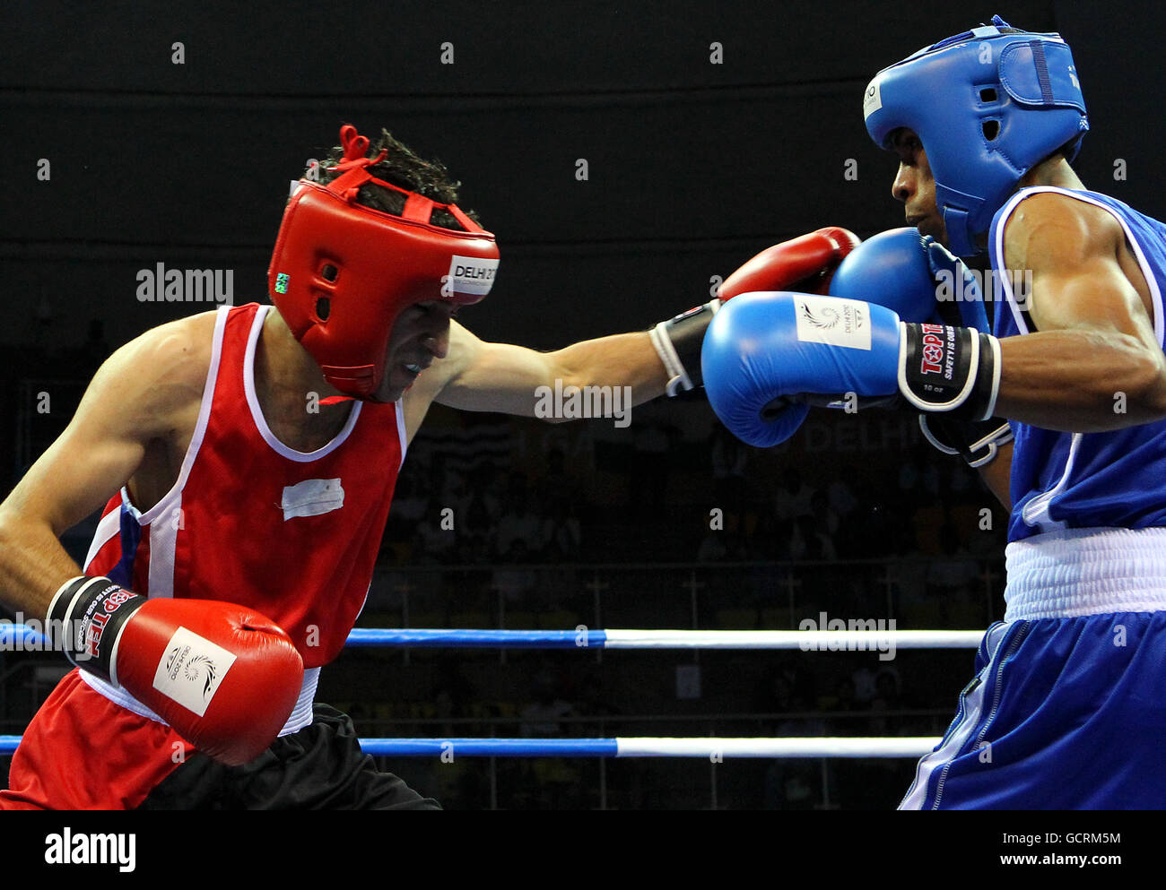 Pakistan's Haroon Kahn in action against Mauritius' Gilbert Bactora in ...