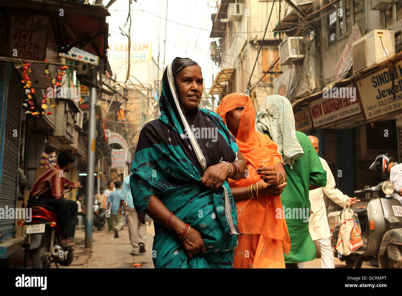 Travel Stock - India - Delhi. People go about their business on the ...