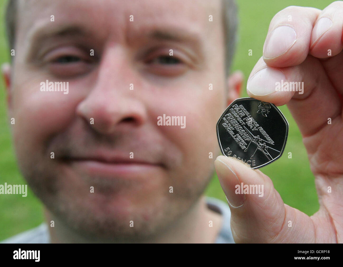 With his olympic 50p coin design for rowing hi-res stock photography ...