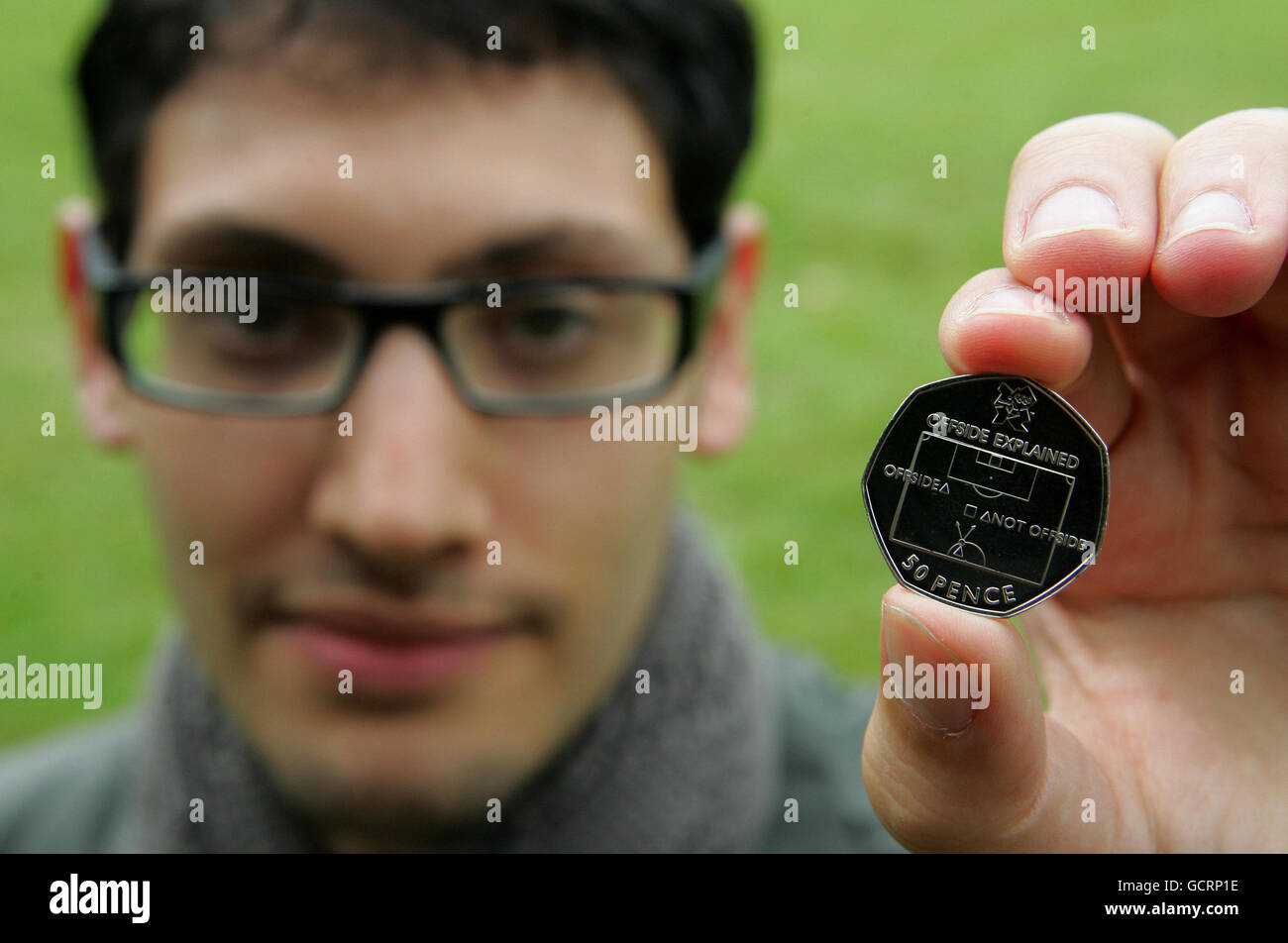 Coin football hi-res stock photography and images - Alamy