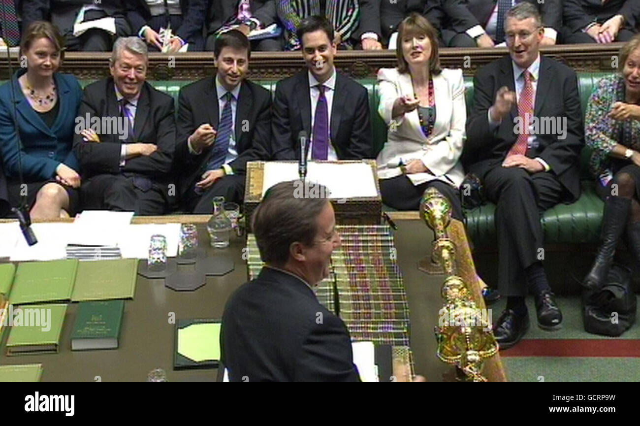 Labour's Front bench reacts as Prime Minister David Cameron speaks ...