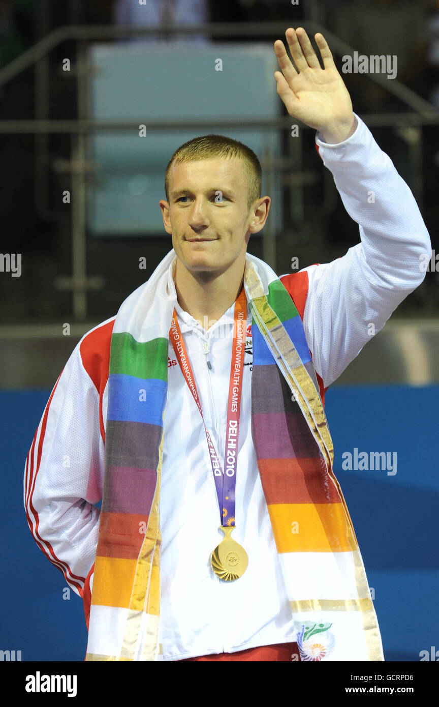 England's Thomas Stalker celebrates winning the gold medal in the light ...